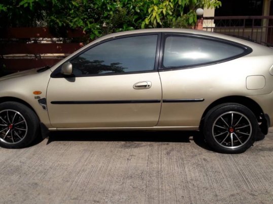 รถสปอร์ต 3 ประตู Ford LASER ปี 1998 เครื่องยนต์ DOCH 1.8L 7560323
