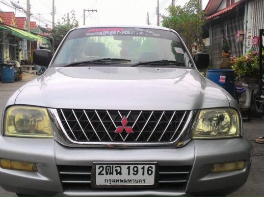 2003 Mitsubishi Strada MEGA CAB GLX pickup 9696082